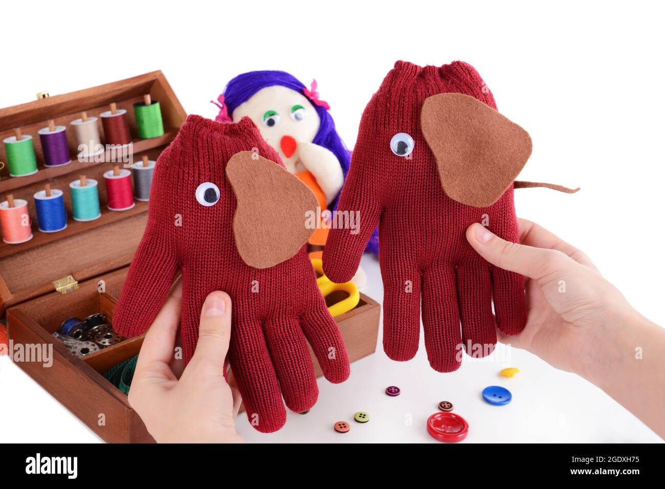 Making of handmade toys from gloves on white background Stock Photo - Alamy
