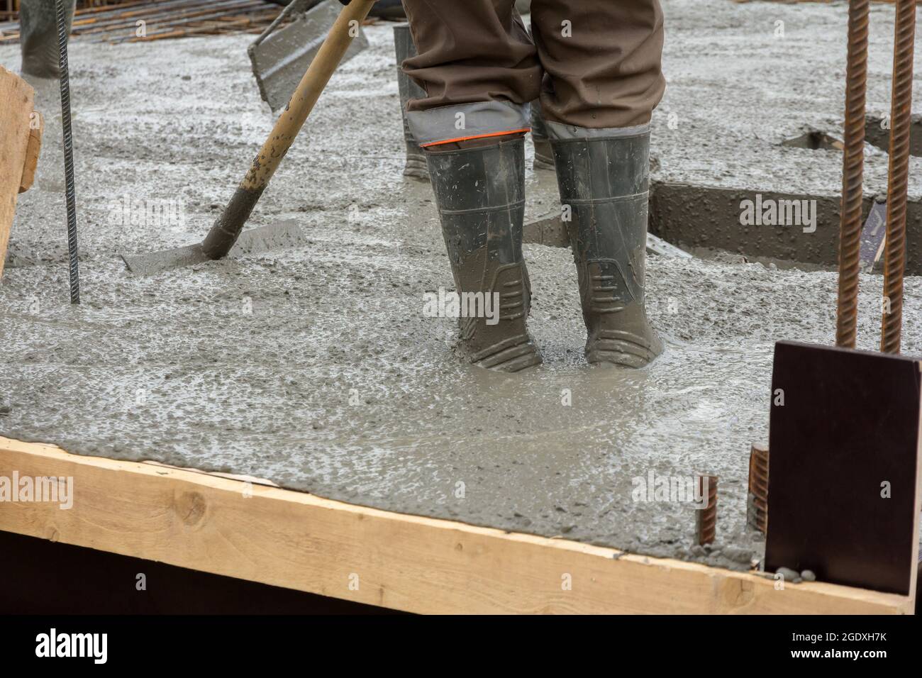 The Process Of Pouring A Monolithic Slab At A Construction Site