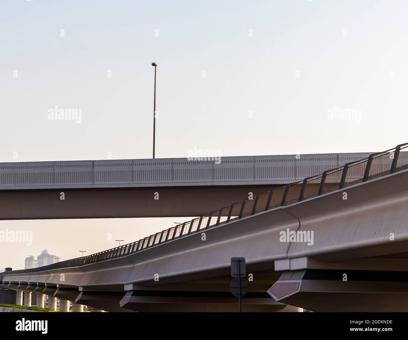 Dubai, UAE - 08.14.2021 - Metro train approaching flyover bridge Stock ...