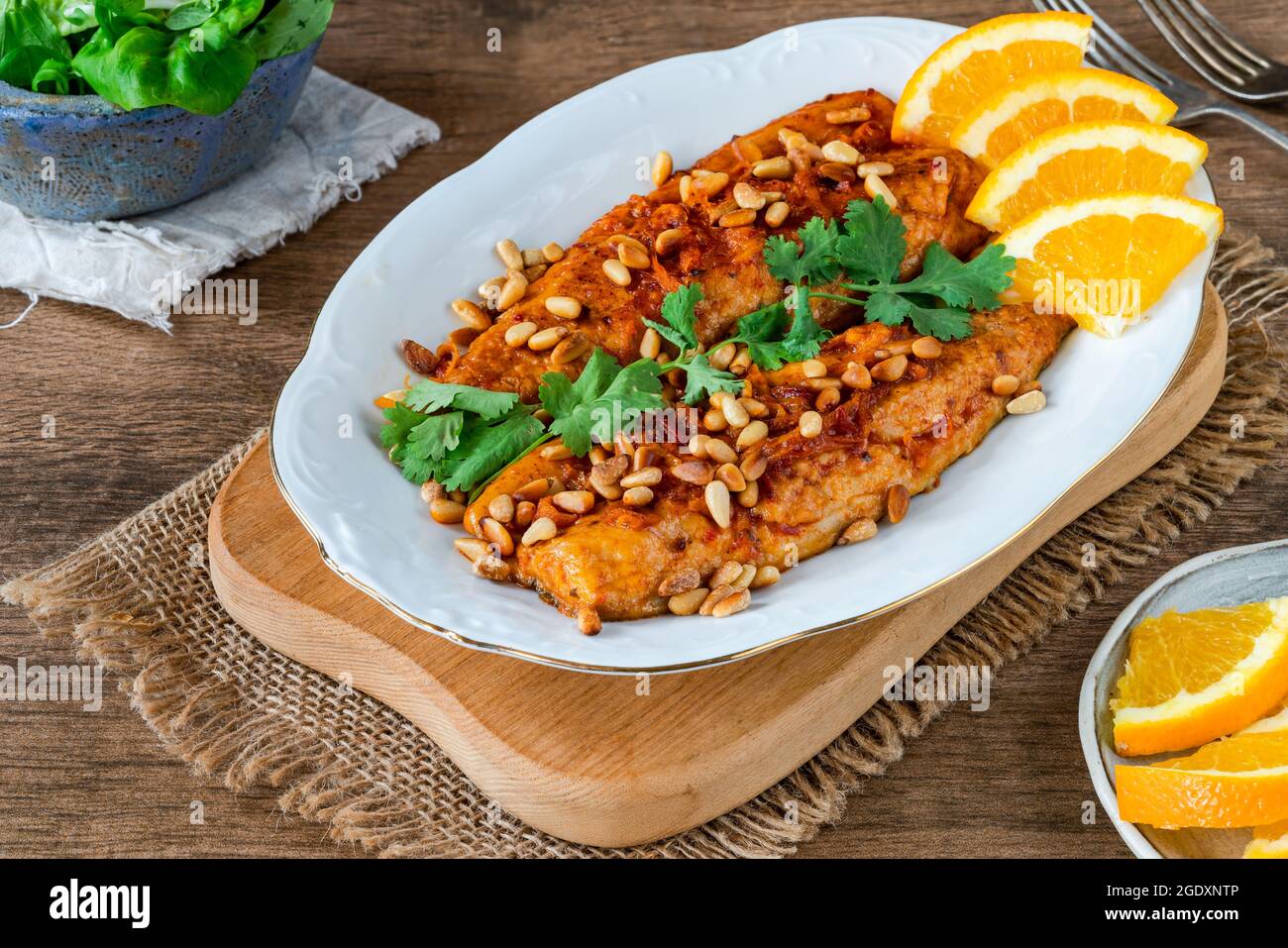Mackerel fillets with orange and harissa glaze, green leaf salad and ...