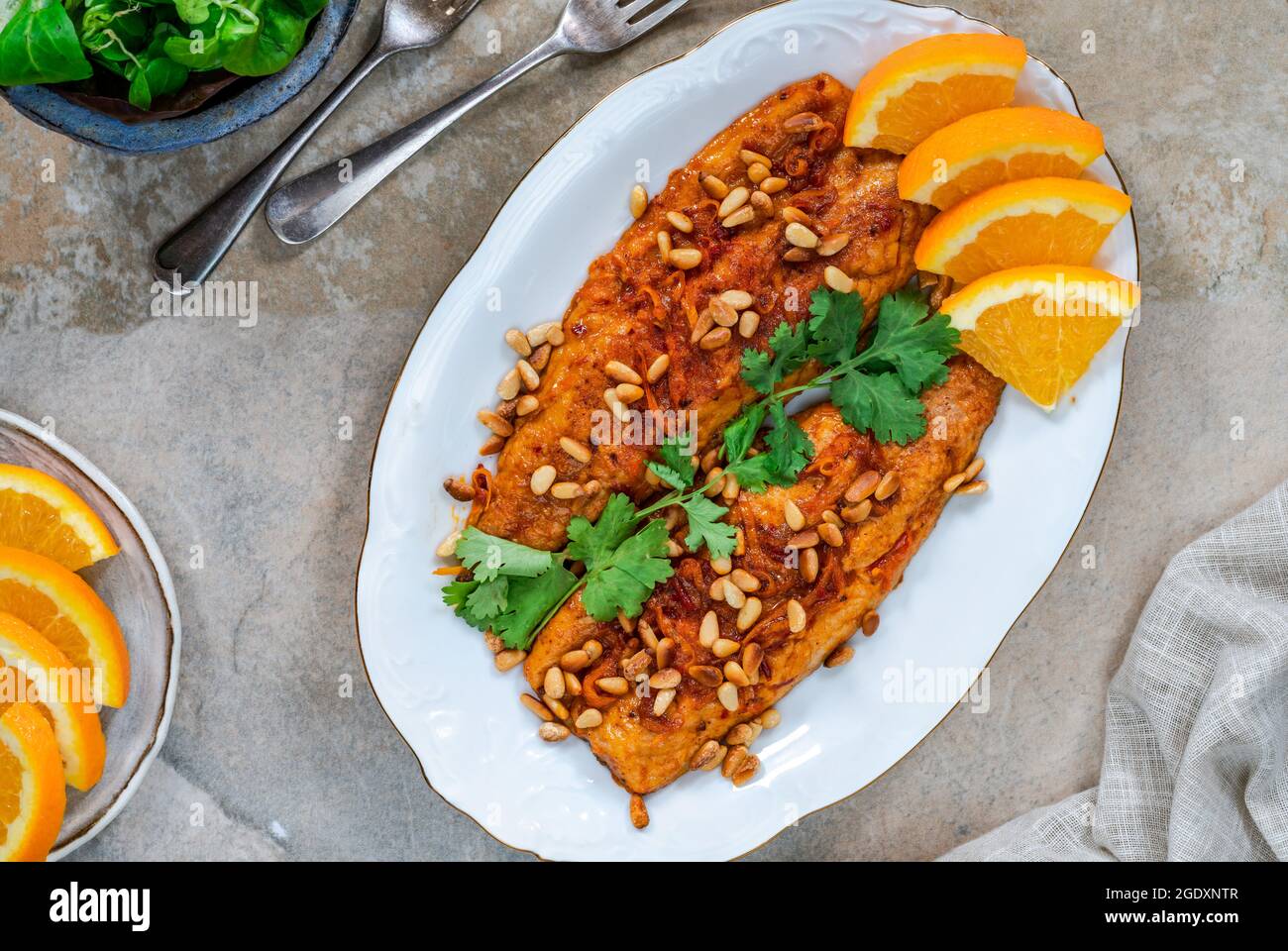 Mackerel fillets with orange and harissa glaze, green leaf salad and ...