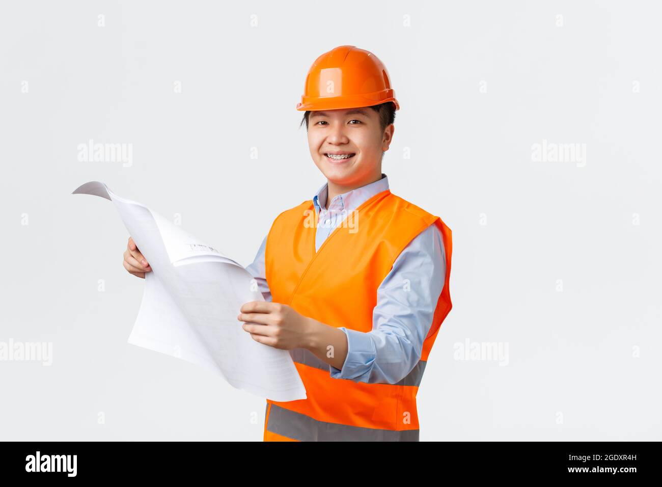 Building sector and industrial workers concept. Confident smiling asian ...