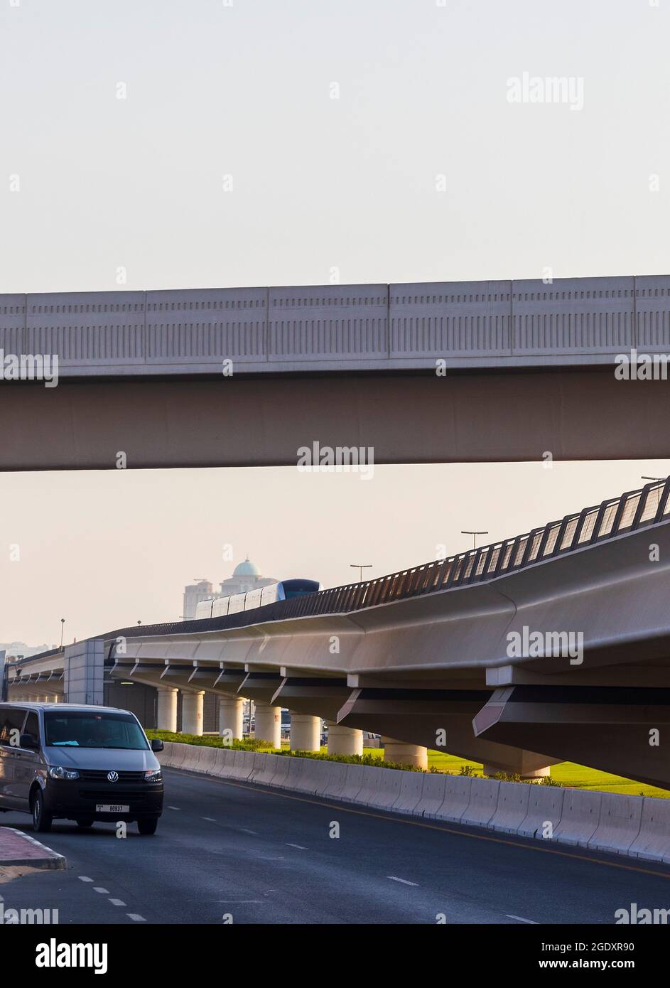 Dubai, UAE - 08.14.2021 - Metro train approaching flyover bridge Stock ...