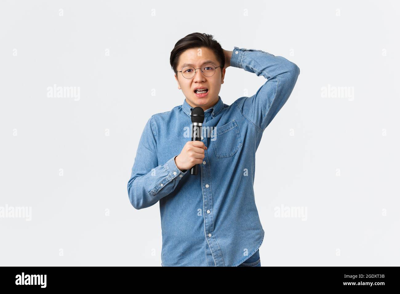 Lifestyle, leisure and people concept. Shy and insecure asian guy ...