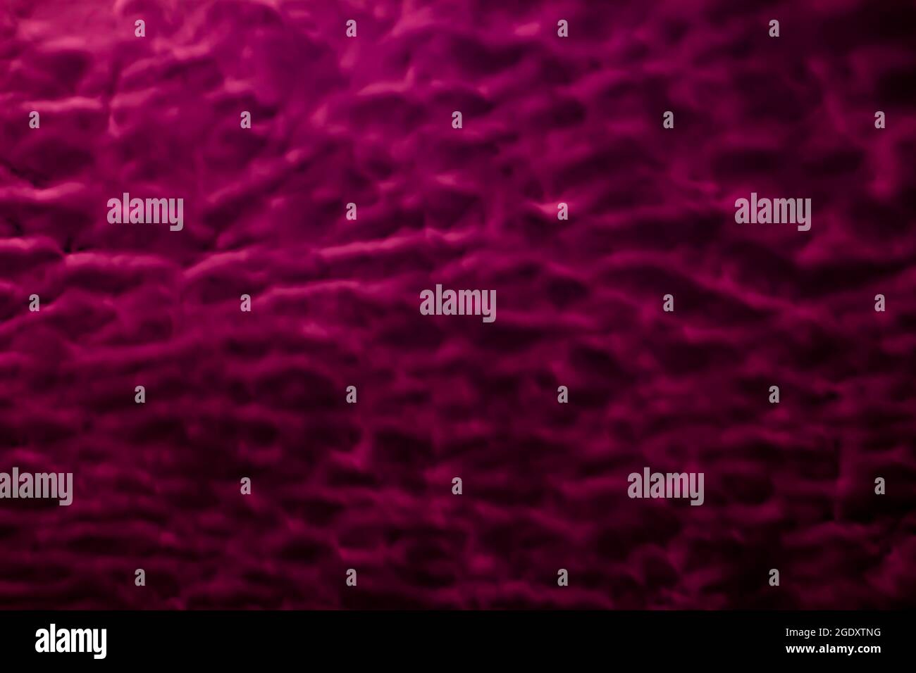 Abstract crimson colored background with textures of different shades ...