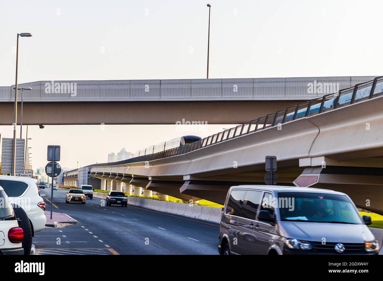 Dubai, UAE - 08.14.2021 - Metro train approaching flyover bridge Stock ...