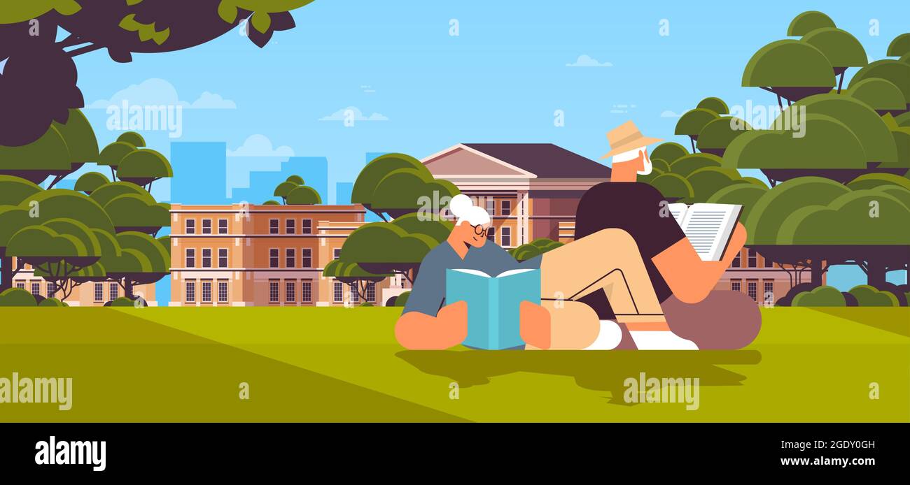 senior couple reading books in urban park old man and woman family ...