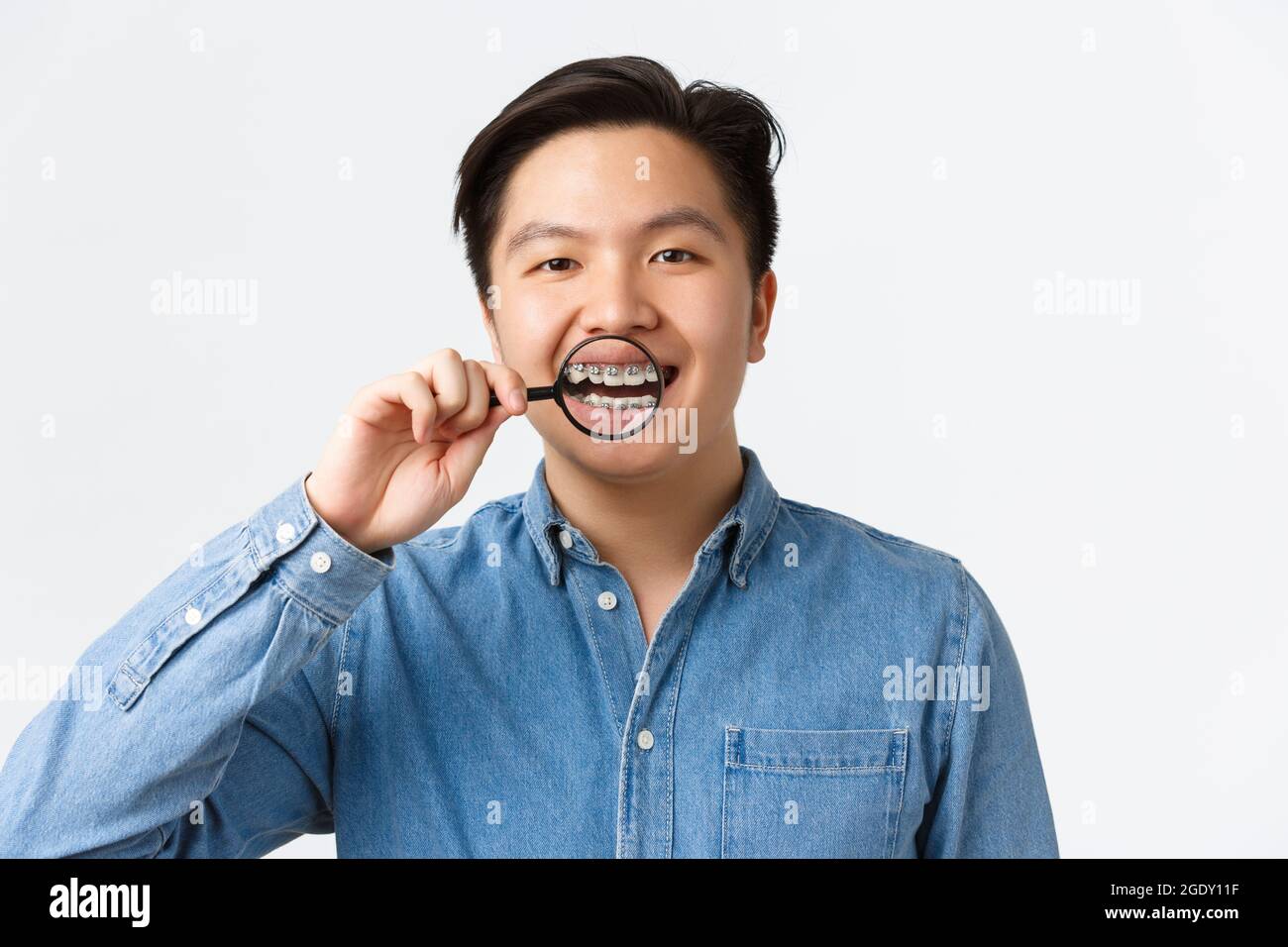 Orthodontics, dental care and stomatology concept. Close-up of young ...