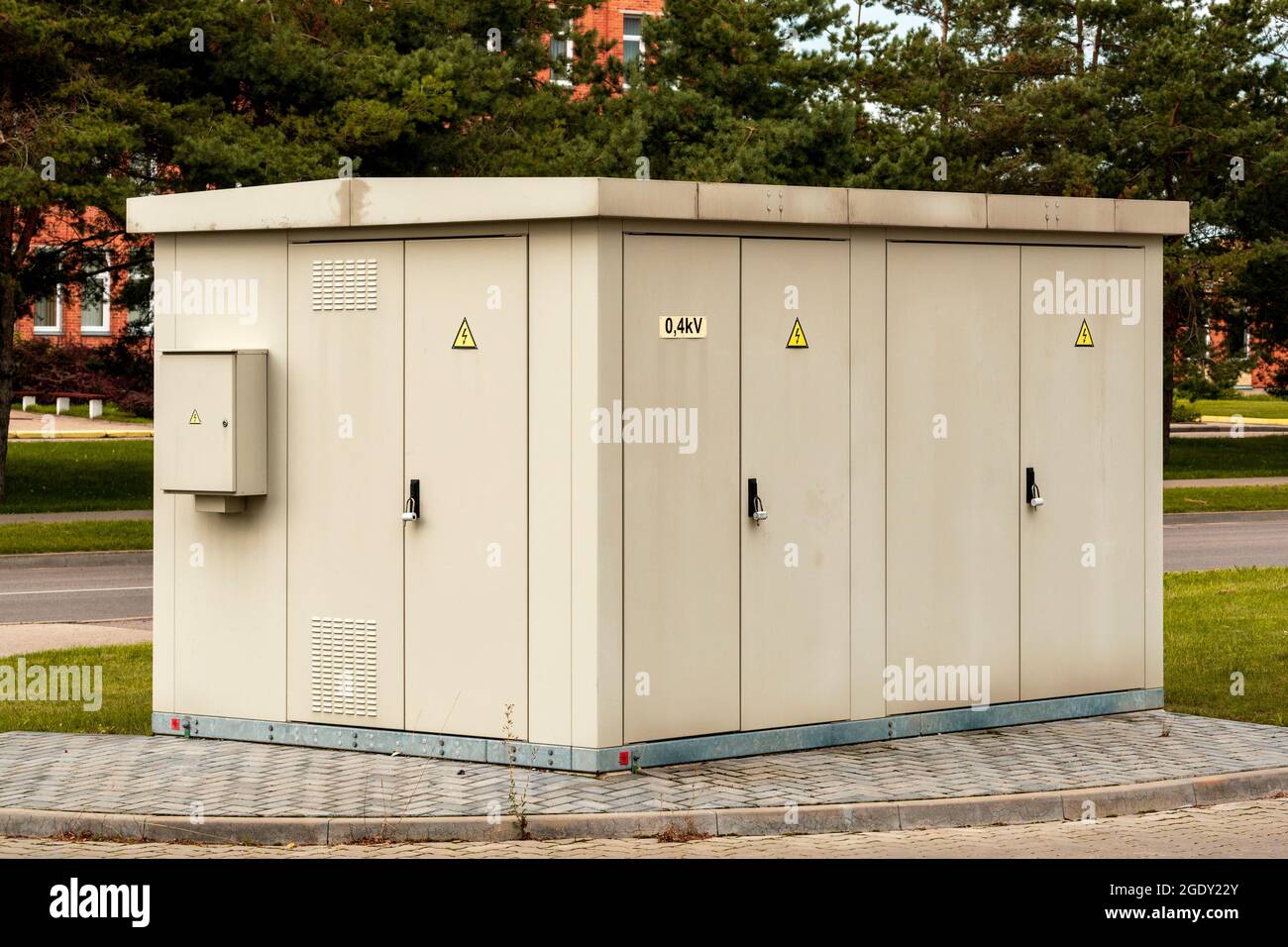 Light gray transformer box on the side of pavement in the city Stock ...