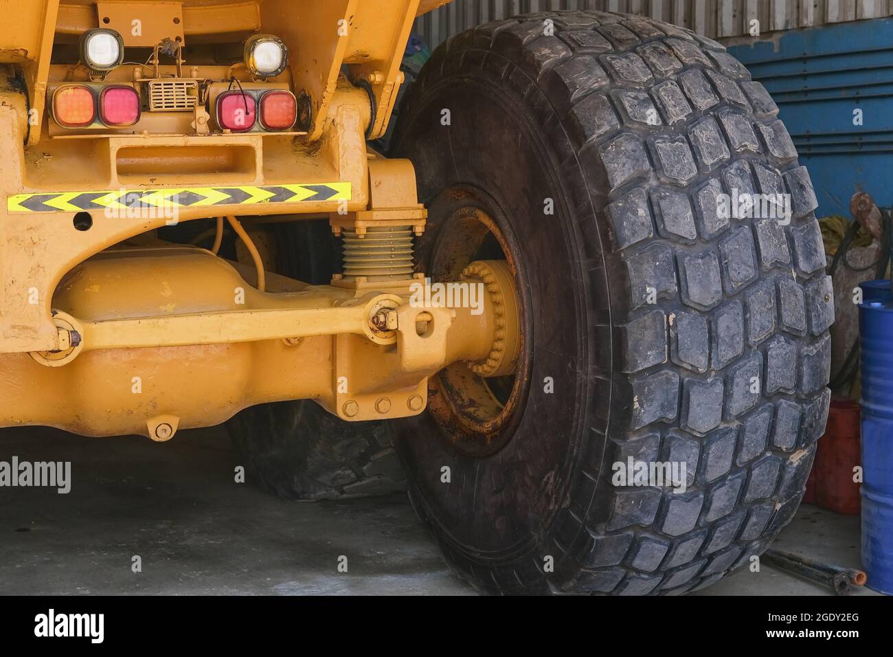 Giant Wheel tire of huge industrial mining truck on repair station ...