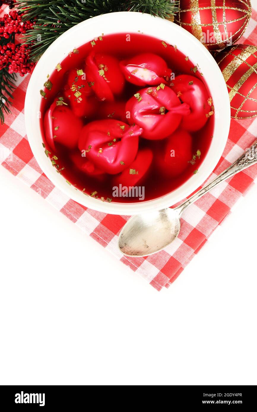 Traditional polish clear red borscht with dumplings and Christmas ...