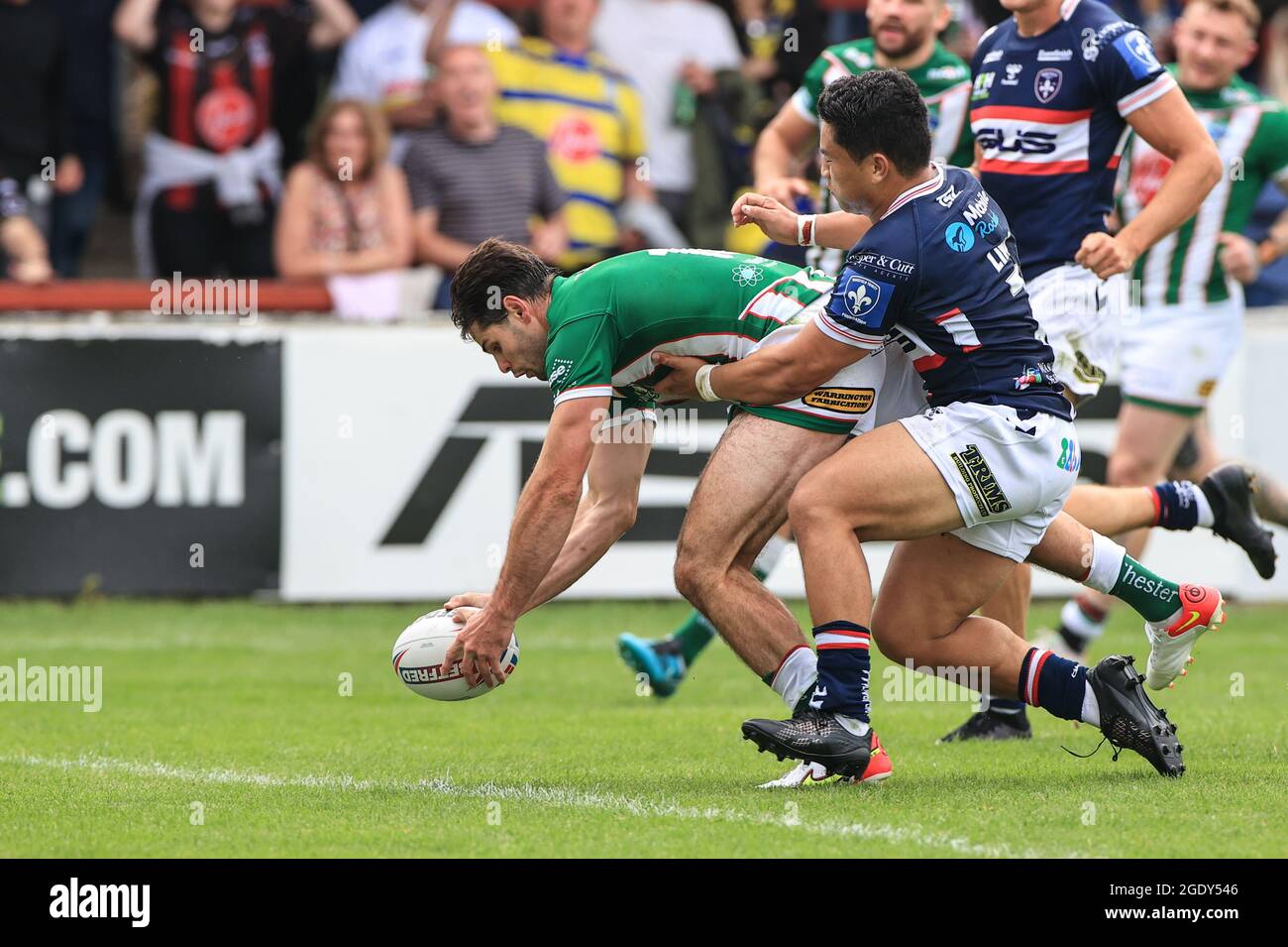 Jake Mamo (18) of Warrington Wolves goes over for a try Stock Photo - Alamy