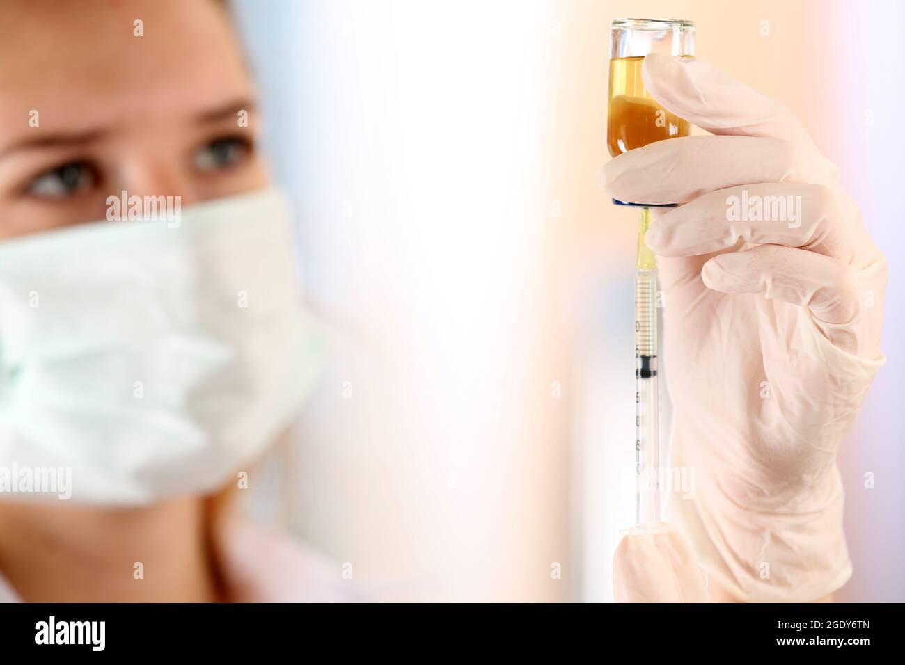 Doctor with medical syringe in hands, getting ready for injection Stock ...