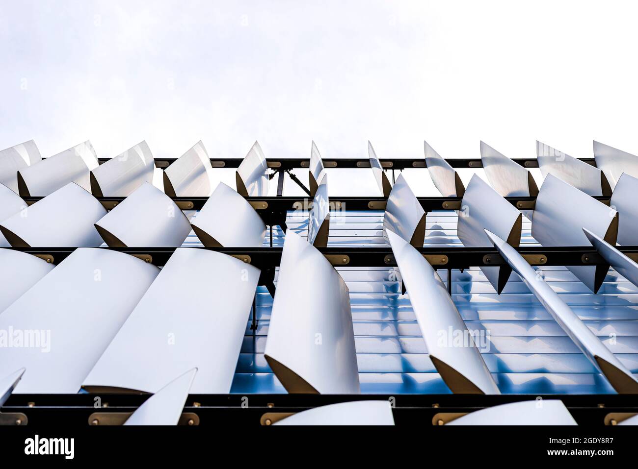 The facade of a modern building with an innovative facade made of ...