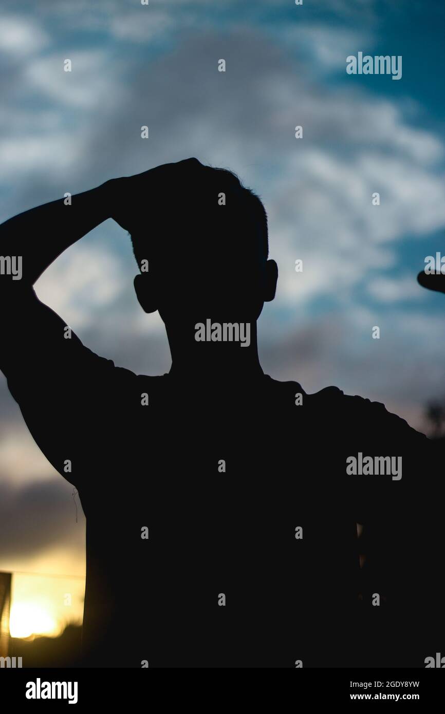 Portrait of a man enjoying the Sunset. Concept of Alone boy. Sunset ...