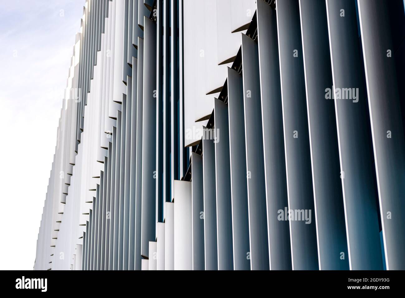 The facade of a modern building with an innovative facade made of ...