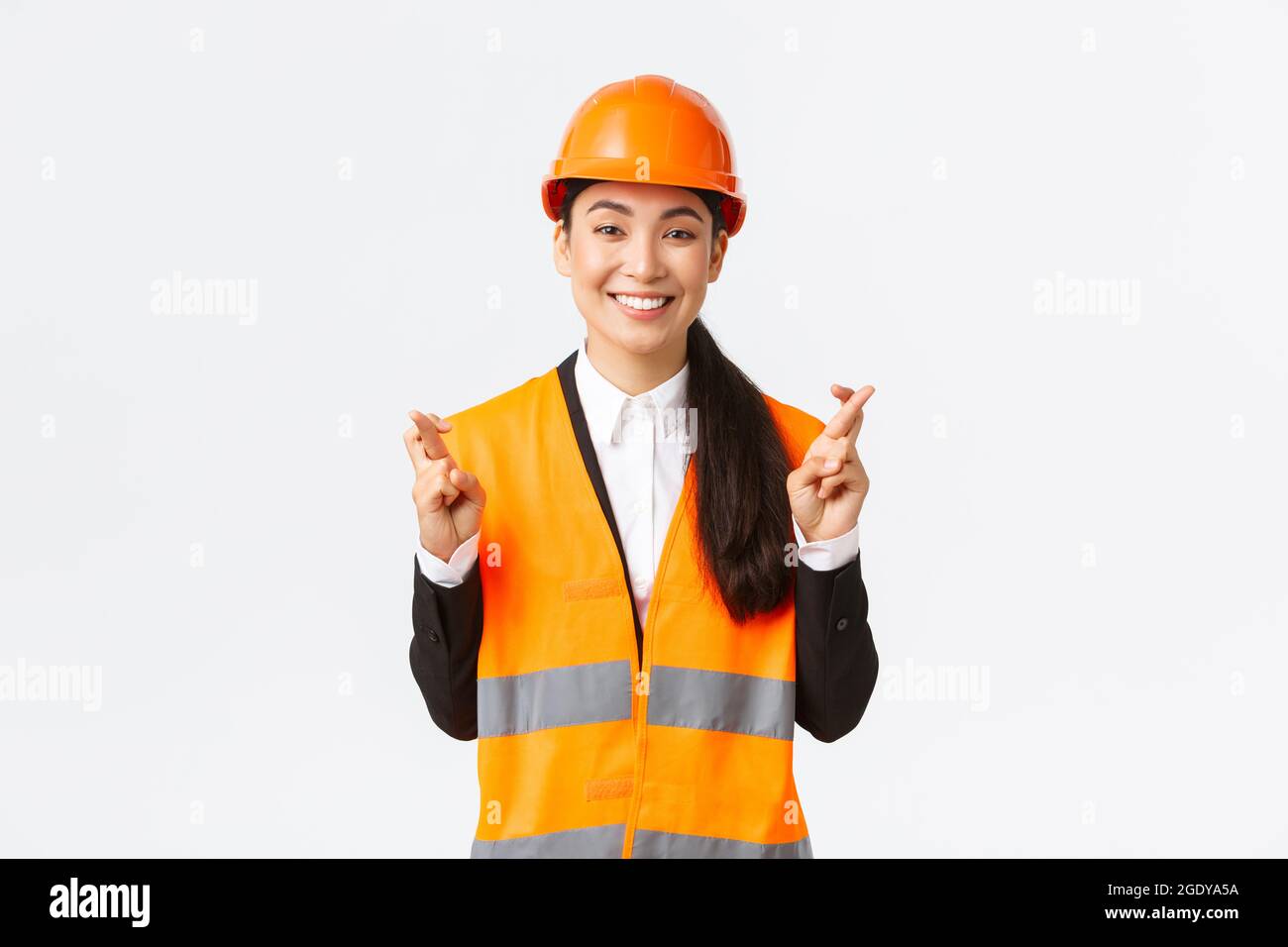Hopeful and optimistic smiling asian female engineer, construction ...