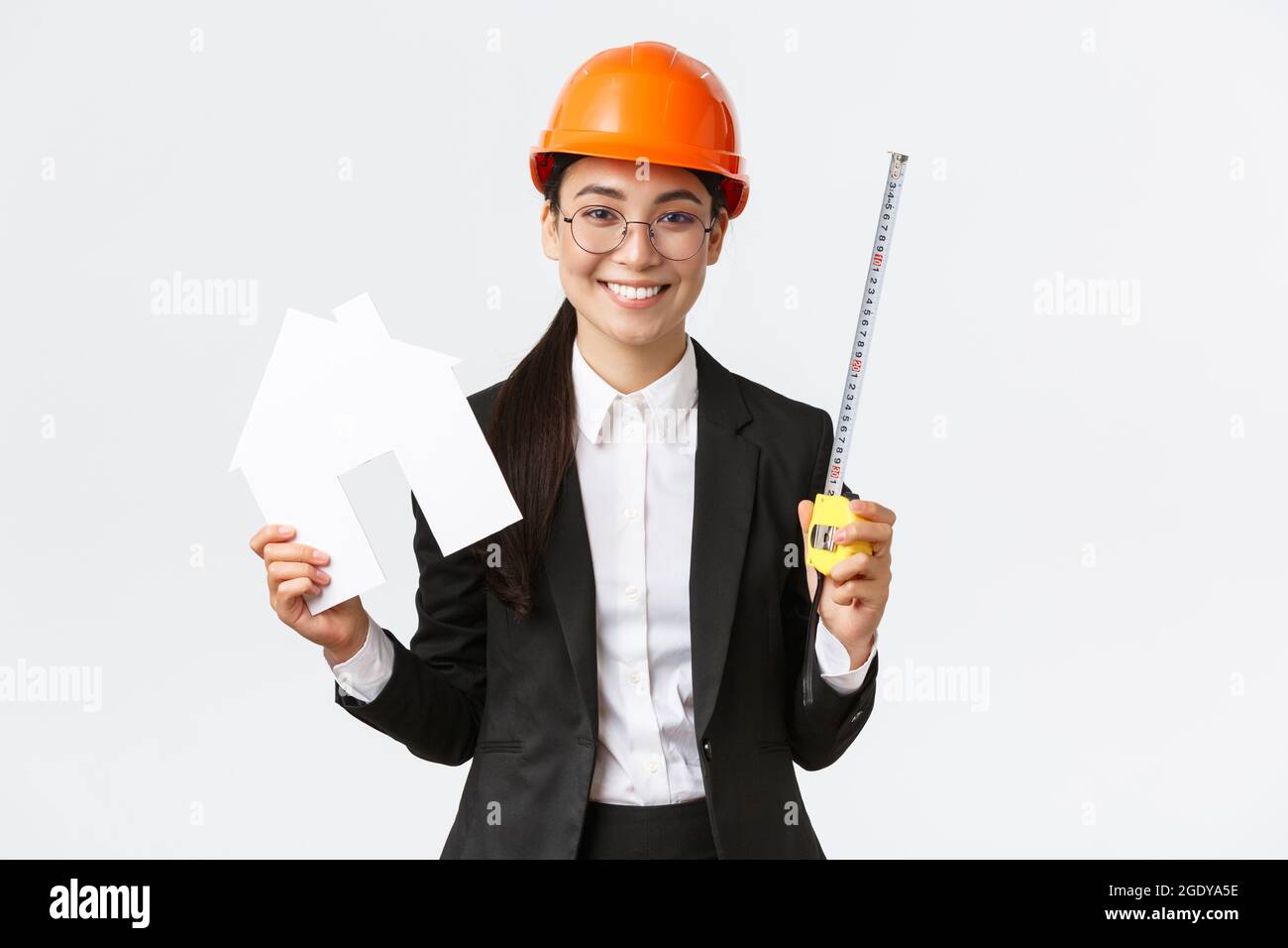 Smiling professional female asian engineer, architect in helmet and ...
