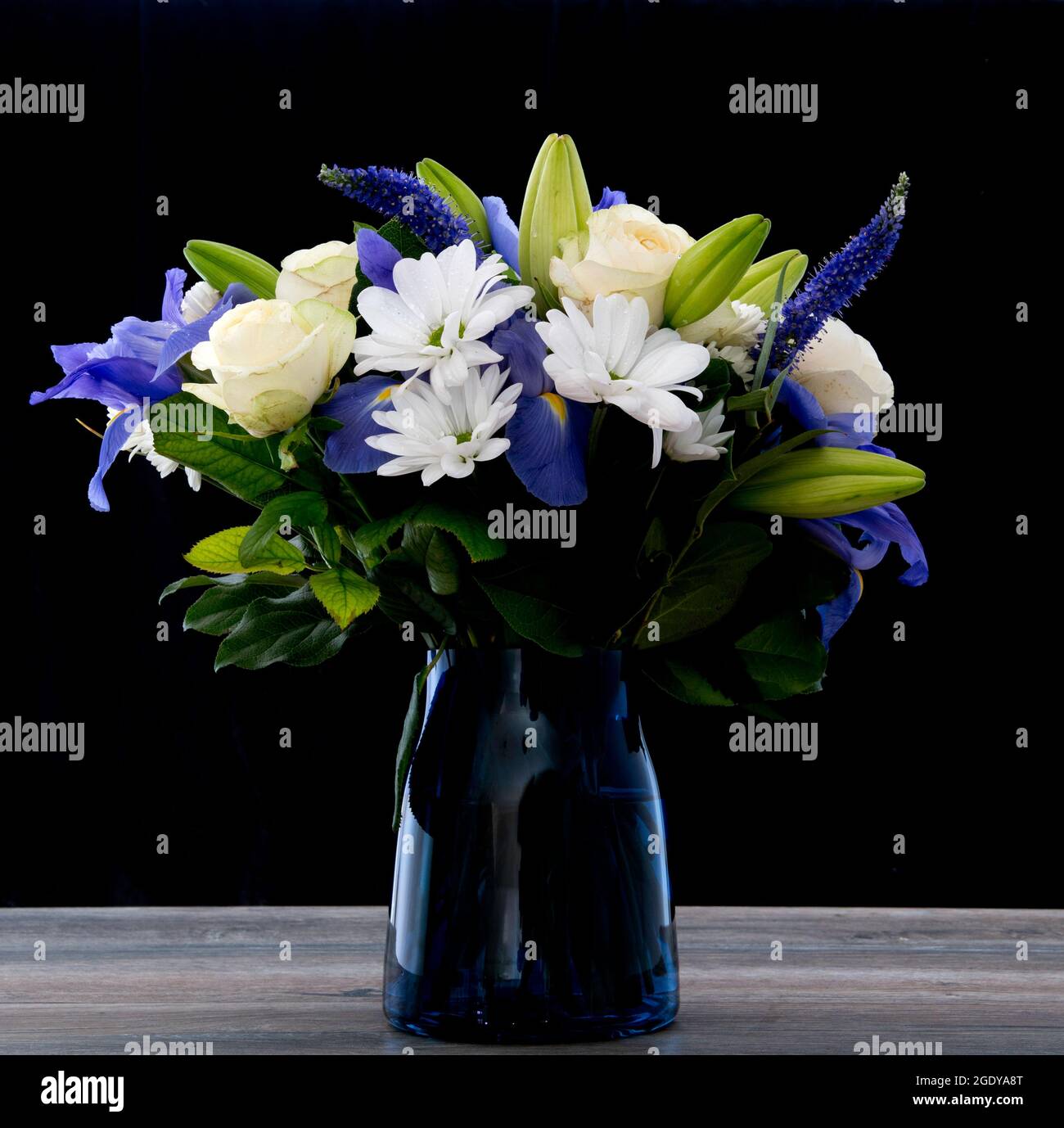Funeral Bouquet purple White flowers, Sympathy and Condolence Concept ...