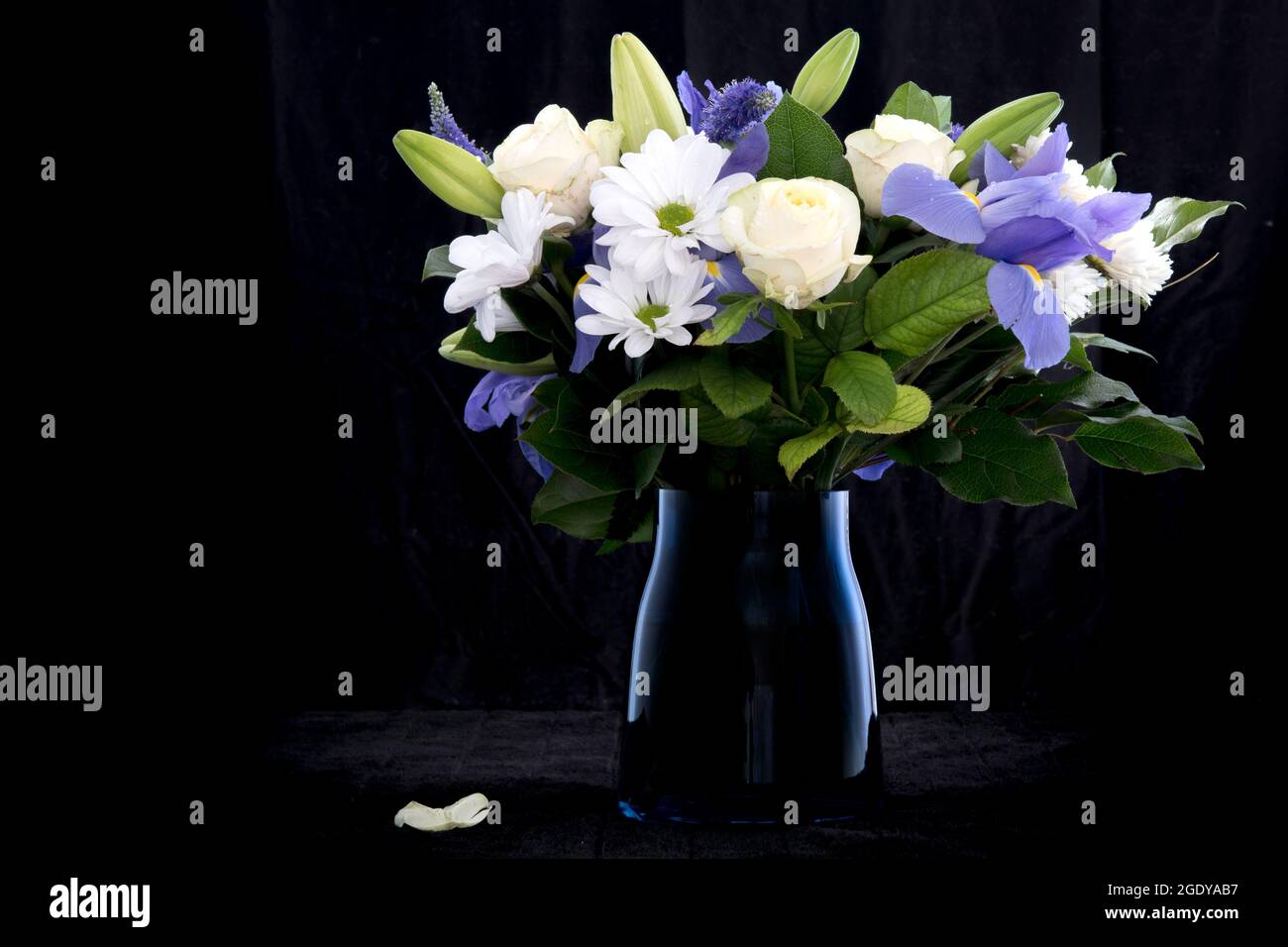 Funeral Bouquet purple White flowers, Sympathy and Condolence Concept ...