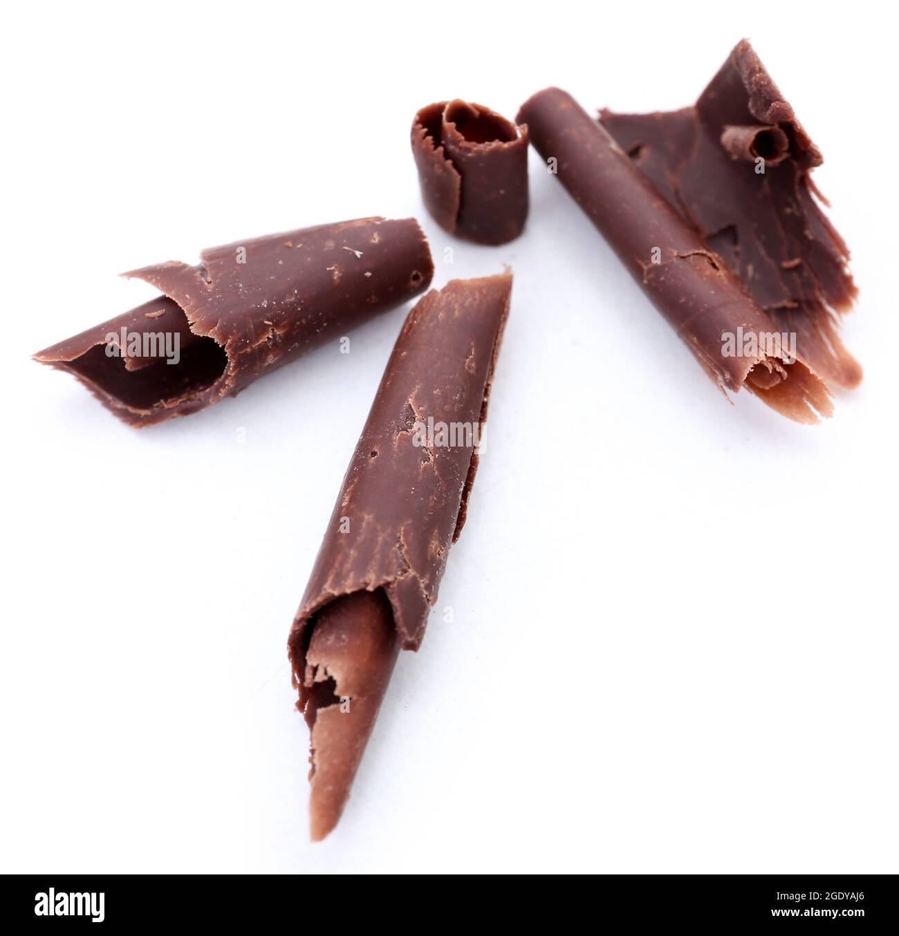 Chocolate curls isolated on white Stock Photo - Alamy