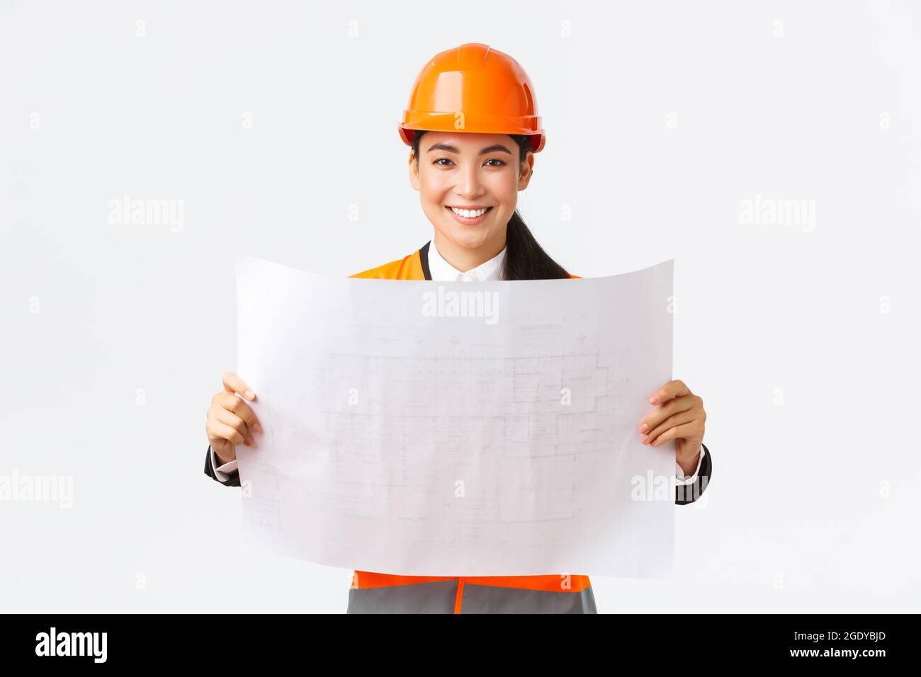 Excited smiling asian female engineer at construction area study ...