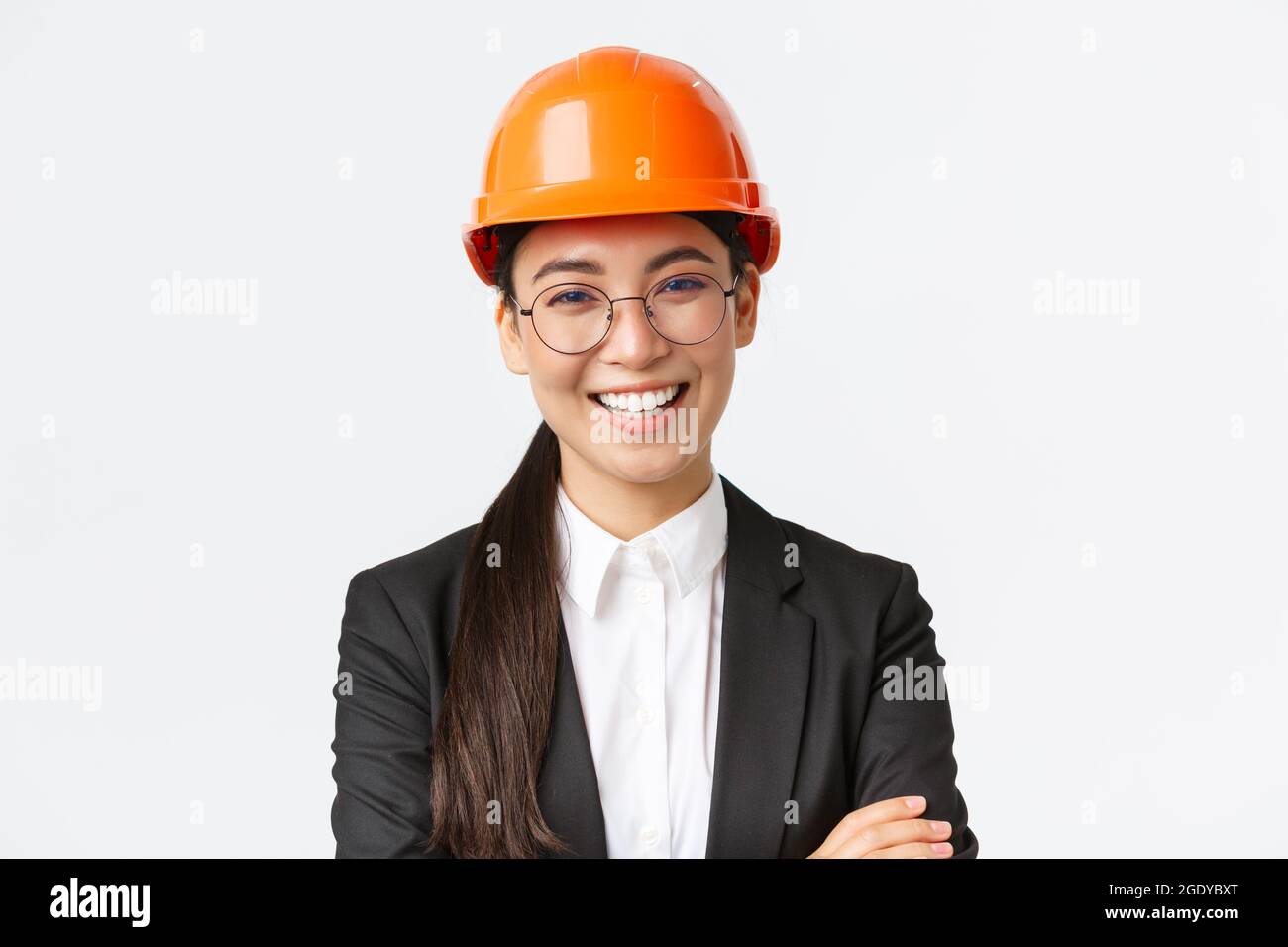 Smiling leader of the team, asian female chief engineer in safety ...