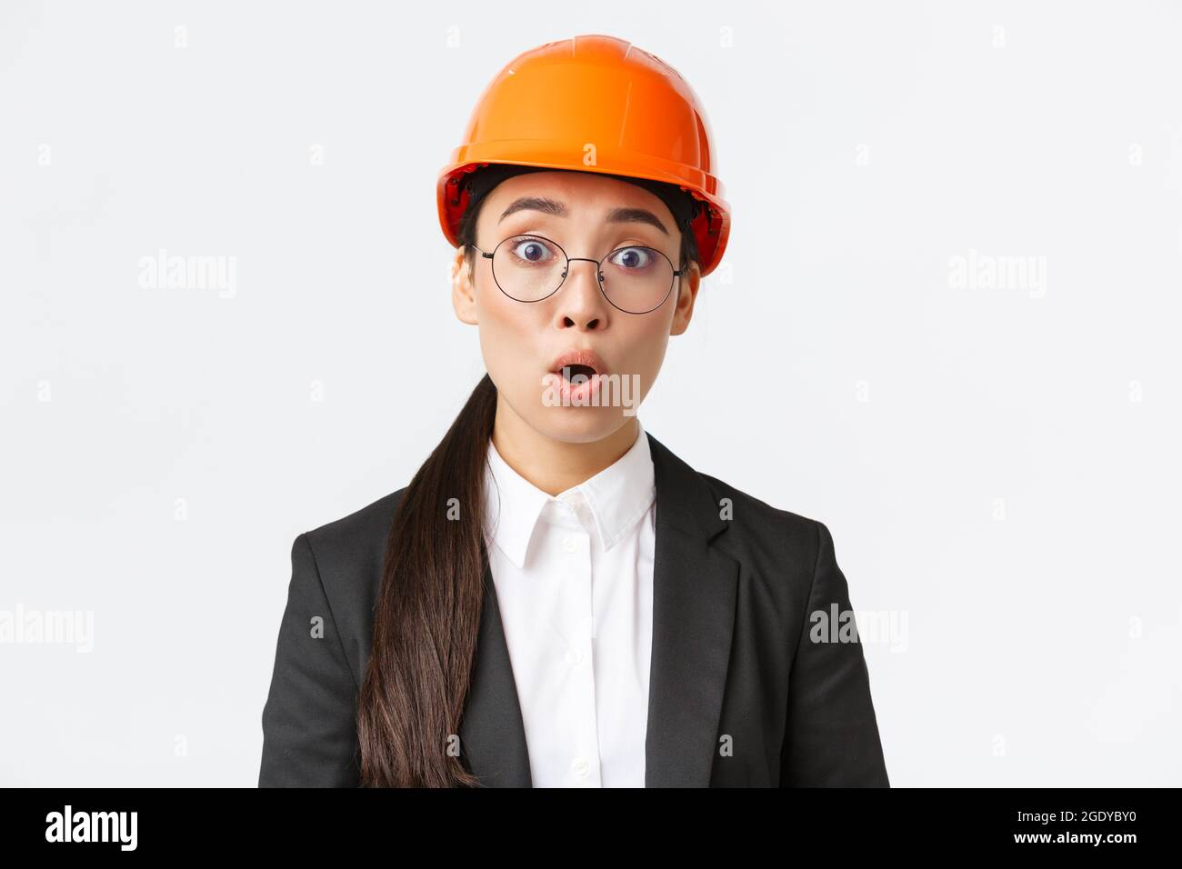 Close-up of shocked and concerned asian female engineer hear bad news ...