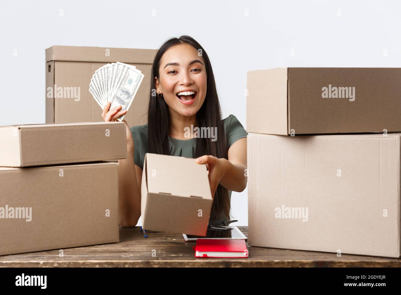 Small business owners, startup and e-commerce concept. Smiling asian ...