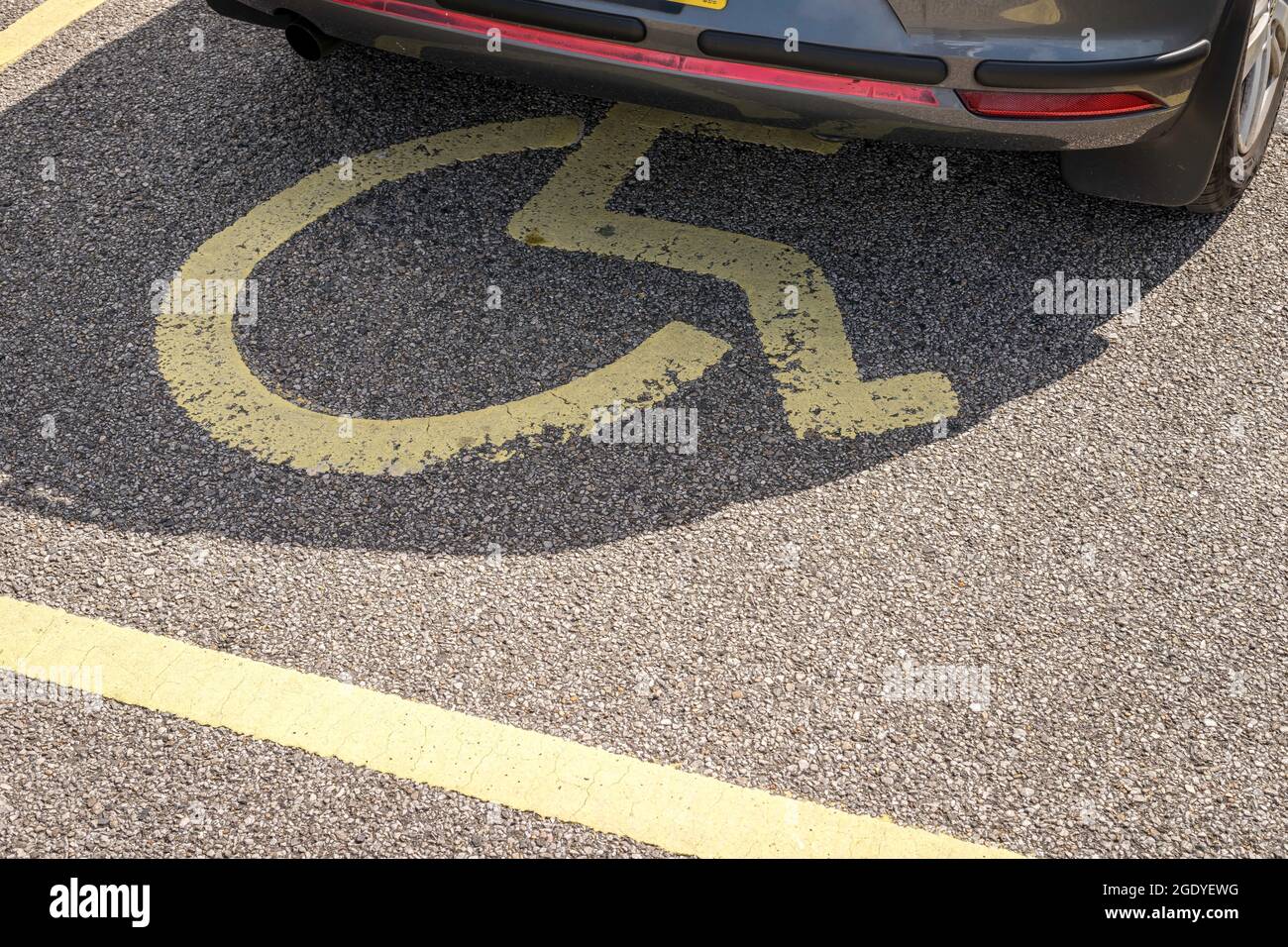 Car on the disabled parking permit Stock Photo - Alamy