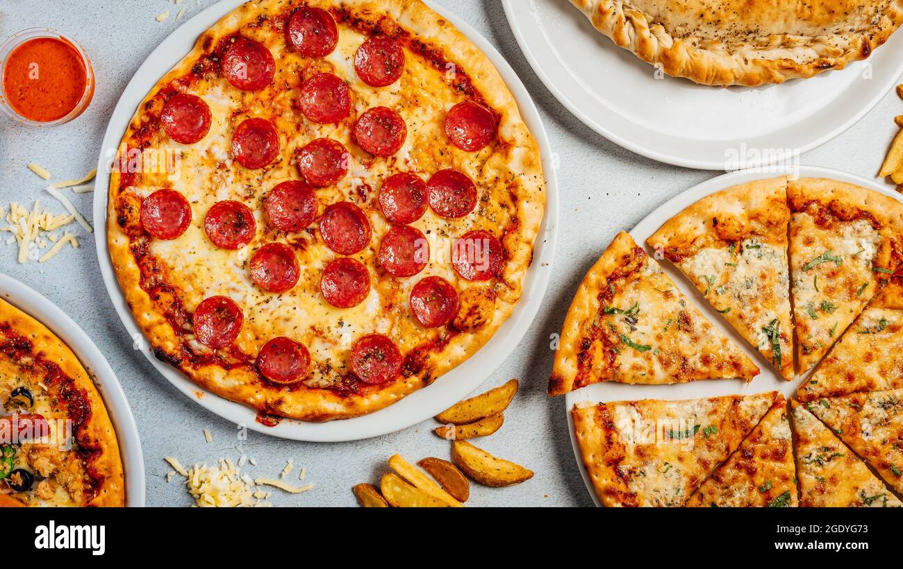 Top view assorted pizzas hi-res stock photography and images - Alamy