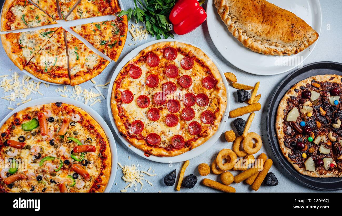 Pizzas party various hi-res stock photography and images - Alamy