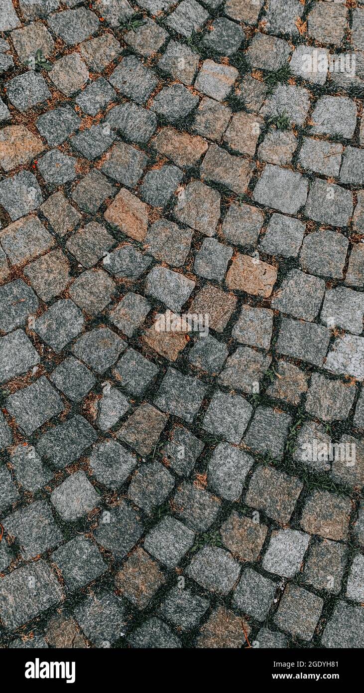 A top view of the colorful cobblestone road Stock Photo - Alamy