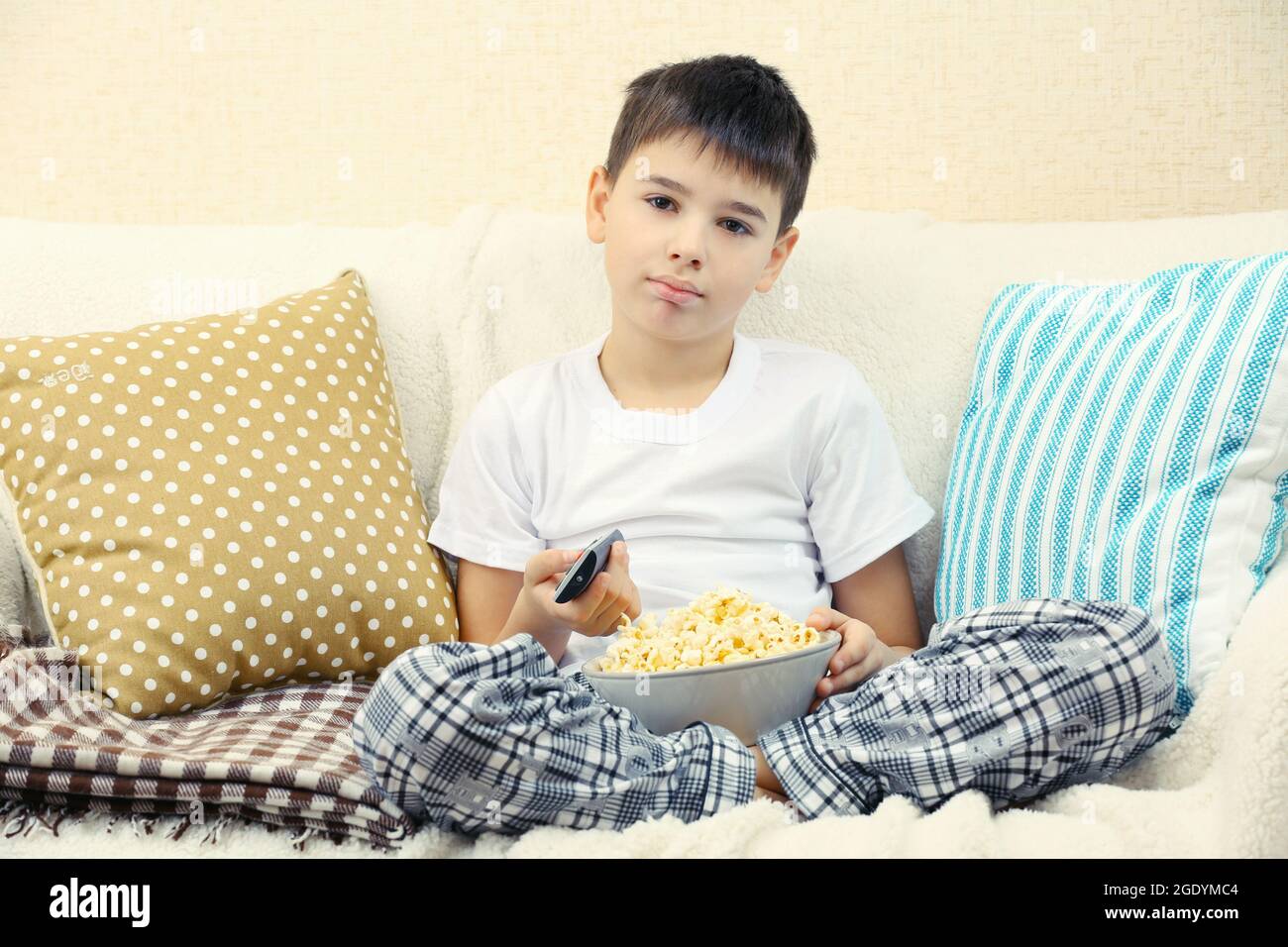 Boy watching TV Stock Photo - Alamy