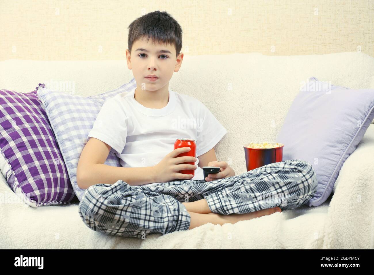 Boy watching TV Stock Photo - Alamy