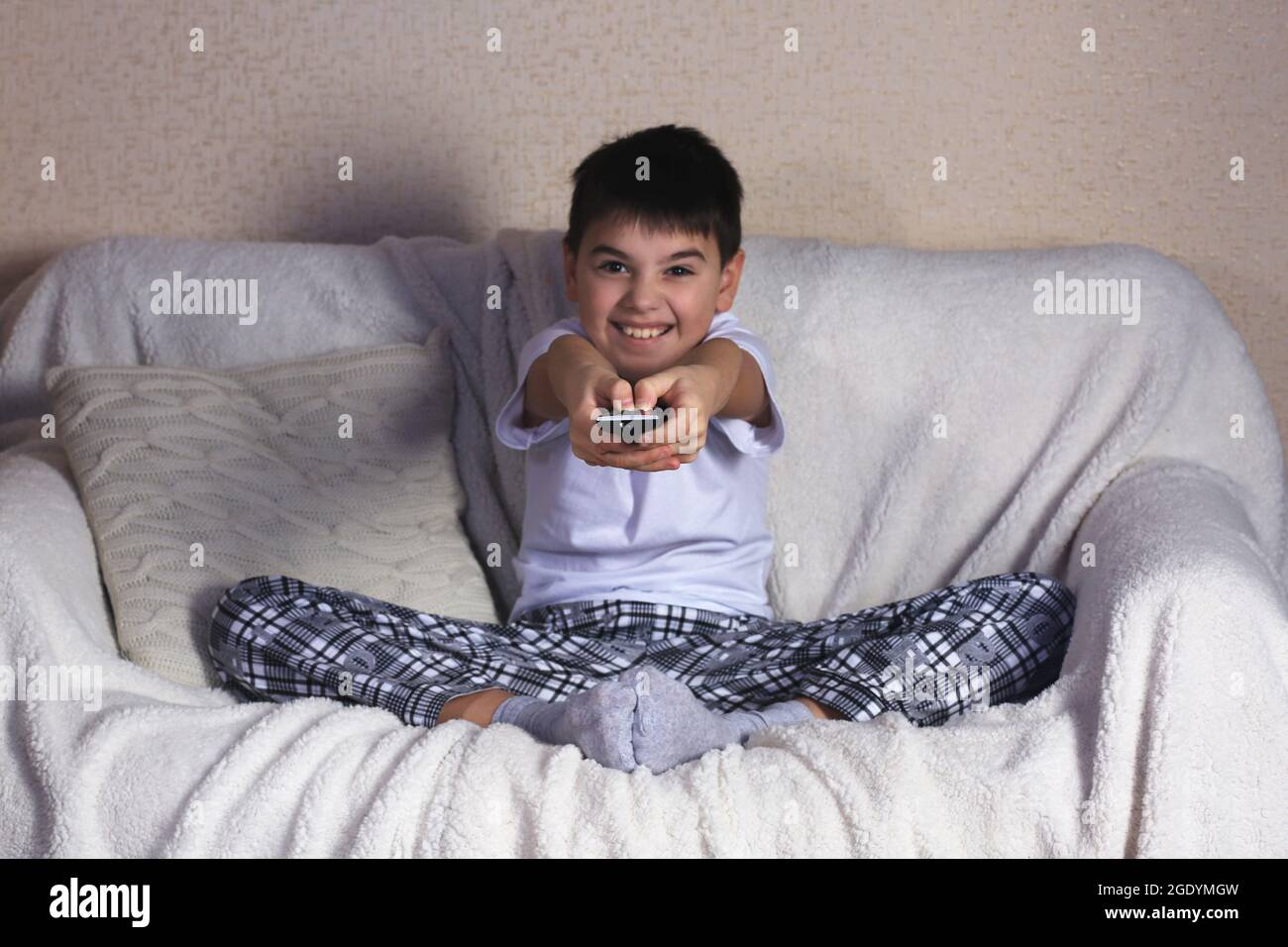 Boy watching TV Stock Photo - Alamy