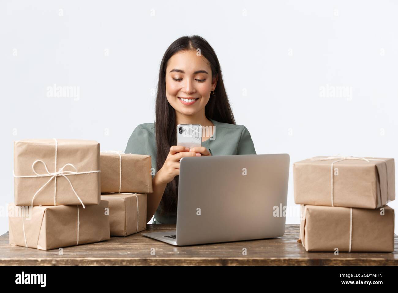 Small business owners, startup and e-commerce concept. Smiling ...