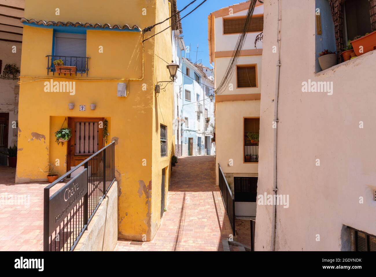 CHELVA, SPAIN - Jul 12, 2021: A narrow pedestrian street with cozy ...