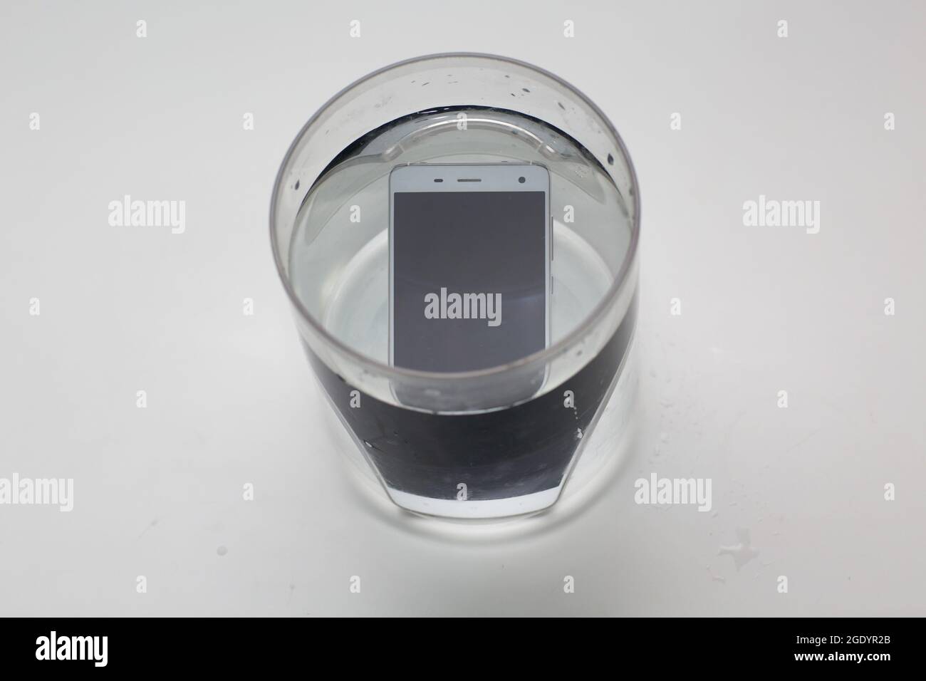 Mobile phone waterproof in vessel with water Stock Photo - Alamy