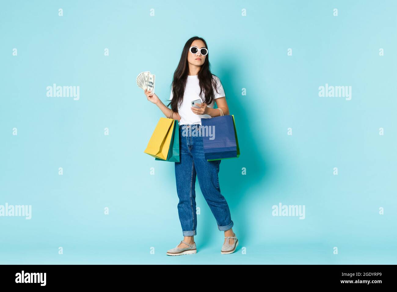 Fashion, beauty and lifestyle concept. Sassy young asian woman in ...