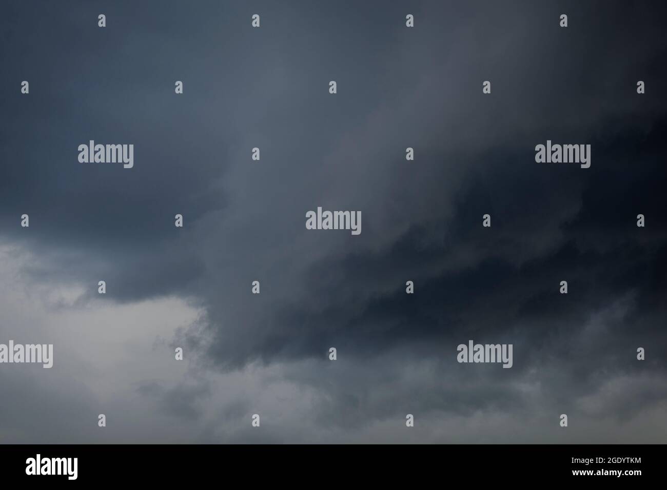 Dramatic black clouds and thunderstorm before rainy. Dark nature ...