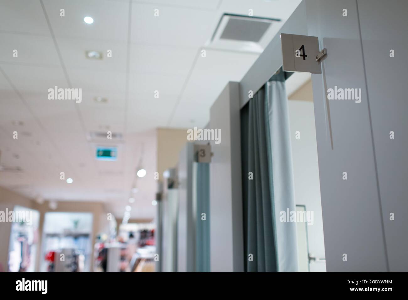 Fitting rooms in the store and number plates Stock Photo - Alamy
