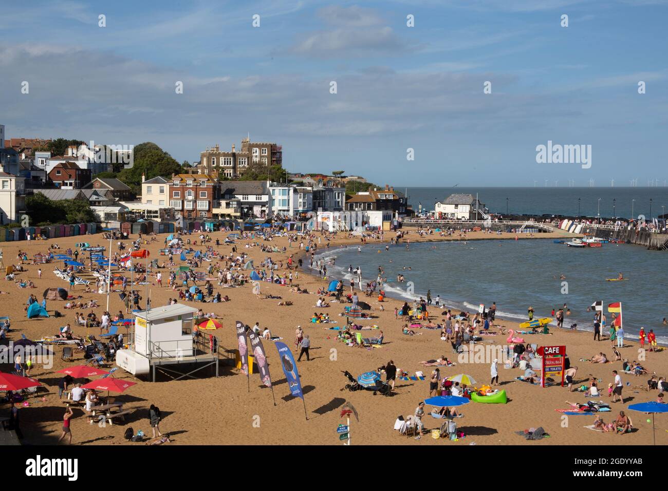 People enjoying the sunshine on a busy Broadstairs beach, Viking Bay ...