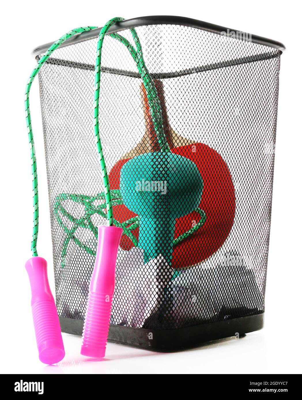 Metal trash bin with sport equipment, crumpled paper and weight scale ...