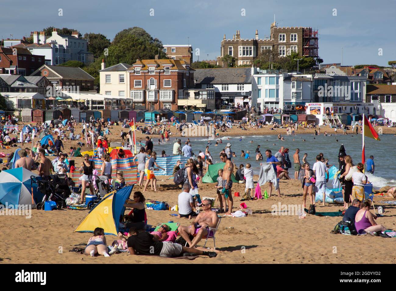 People enjoying the sunshine on a busy Broadstairs beach, Viking Bay ...