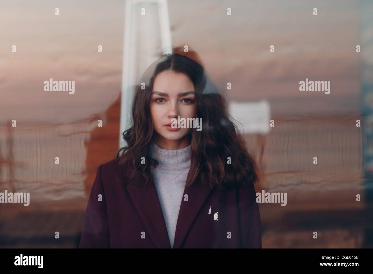 Beautiful young teenager girl portrait behind window glass Stock Photo ...