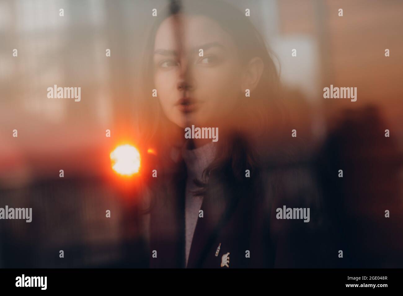 Portrait beautiful woman behind window hi-res stock photography and ...