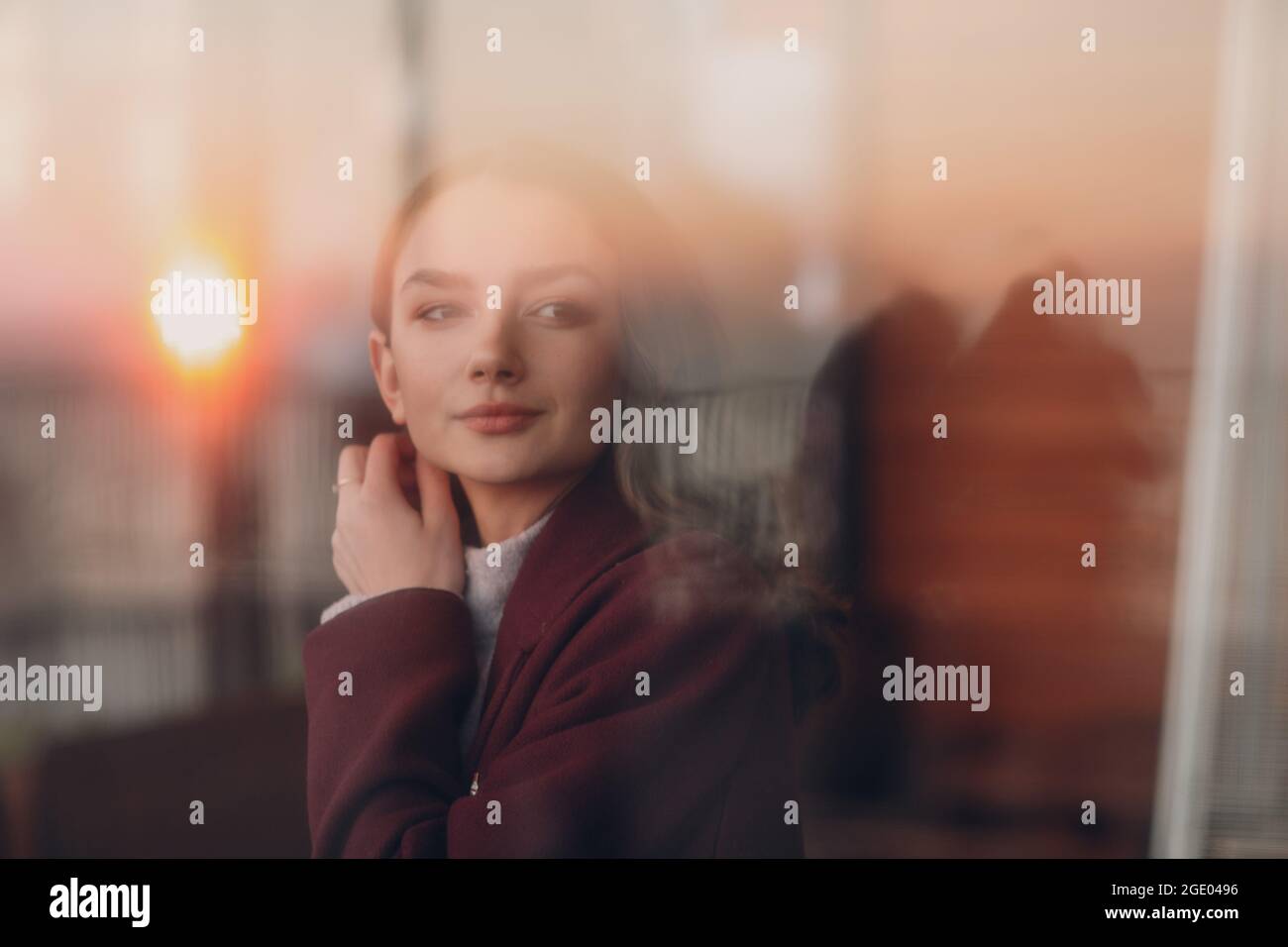 Beautiful young teenager girl portrait behind window glass Stock Photo ...
