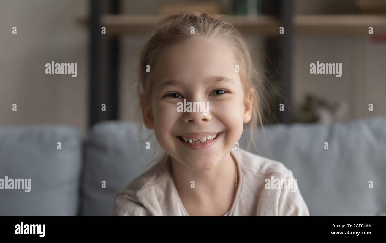 Portrait of smiling little girl talk on webcam call Stock Photo - Alamy