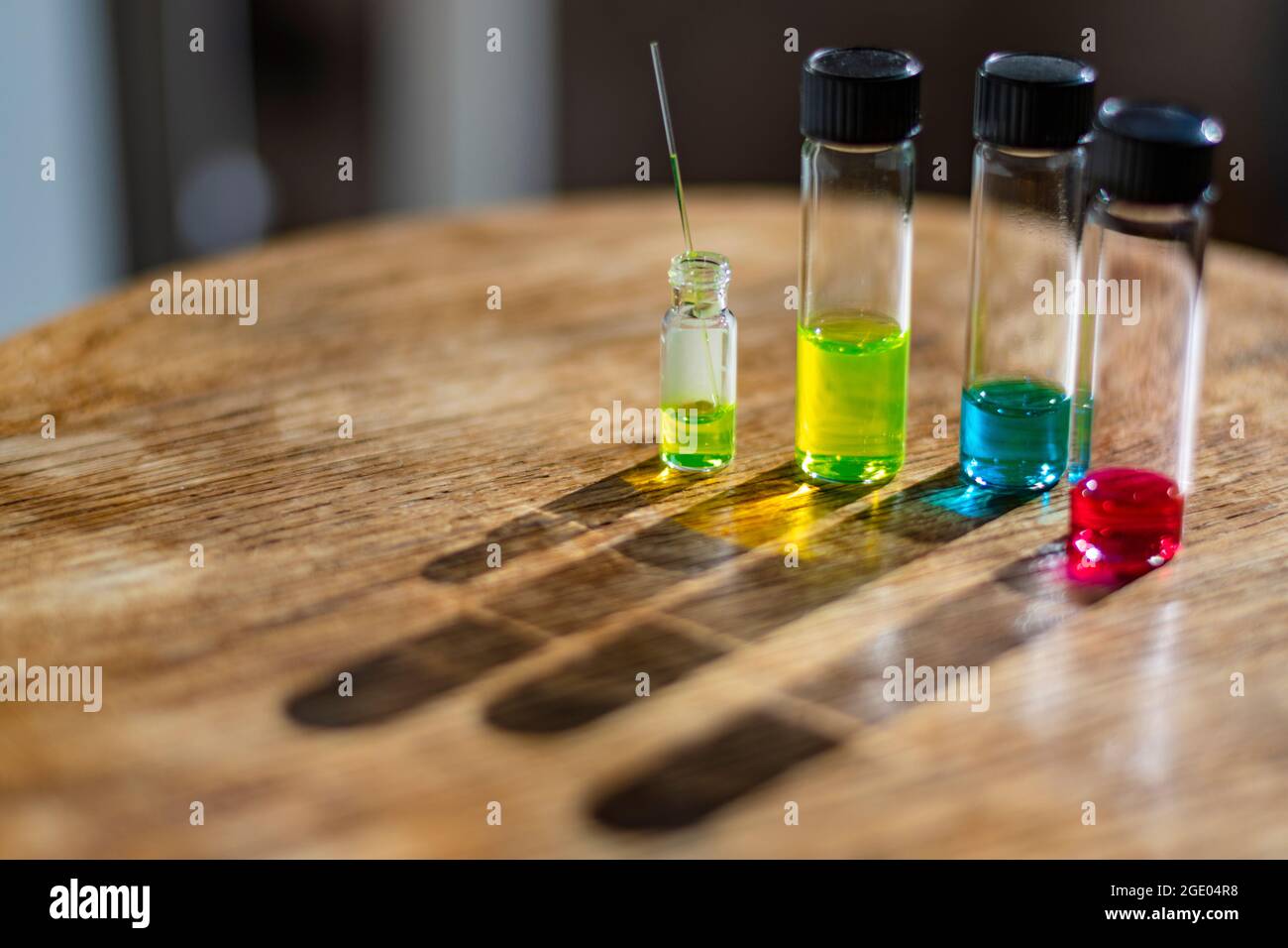 Multiple Colourful solutions in glass vials under the light in a ...